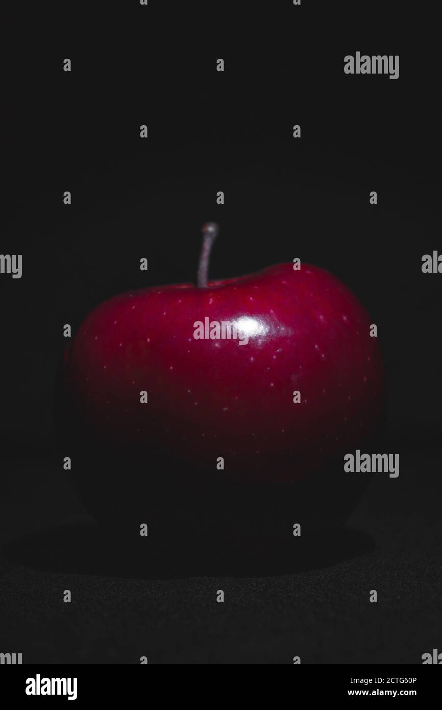 Apple fruit, abstract shadow, black background, red apple Stock Photo ...