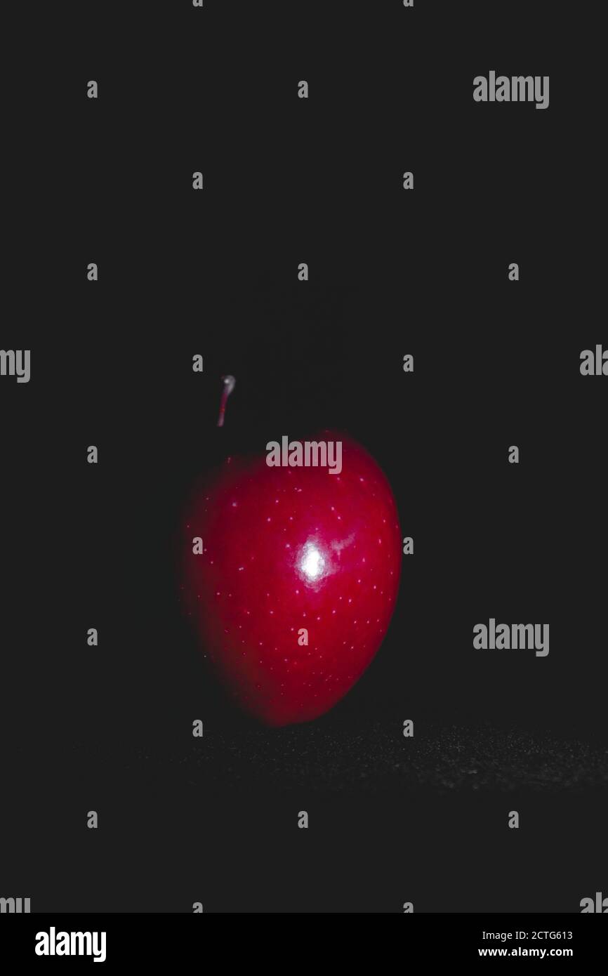 Apple fruit, abstract shadow, black background, red apple Stock Photo ...