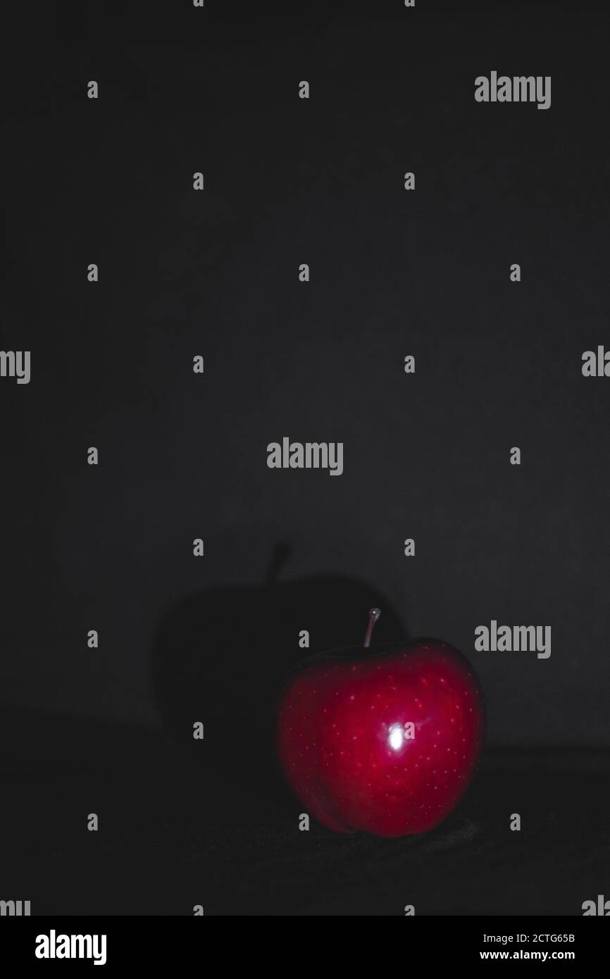 Apple fruit, abstract shadow, black background, red apple Stock Photo ...