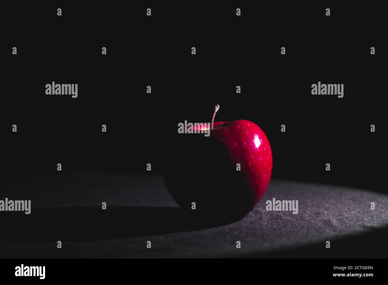 Apple fruit, abstract shadow, black background, red apple Stock Photo ...