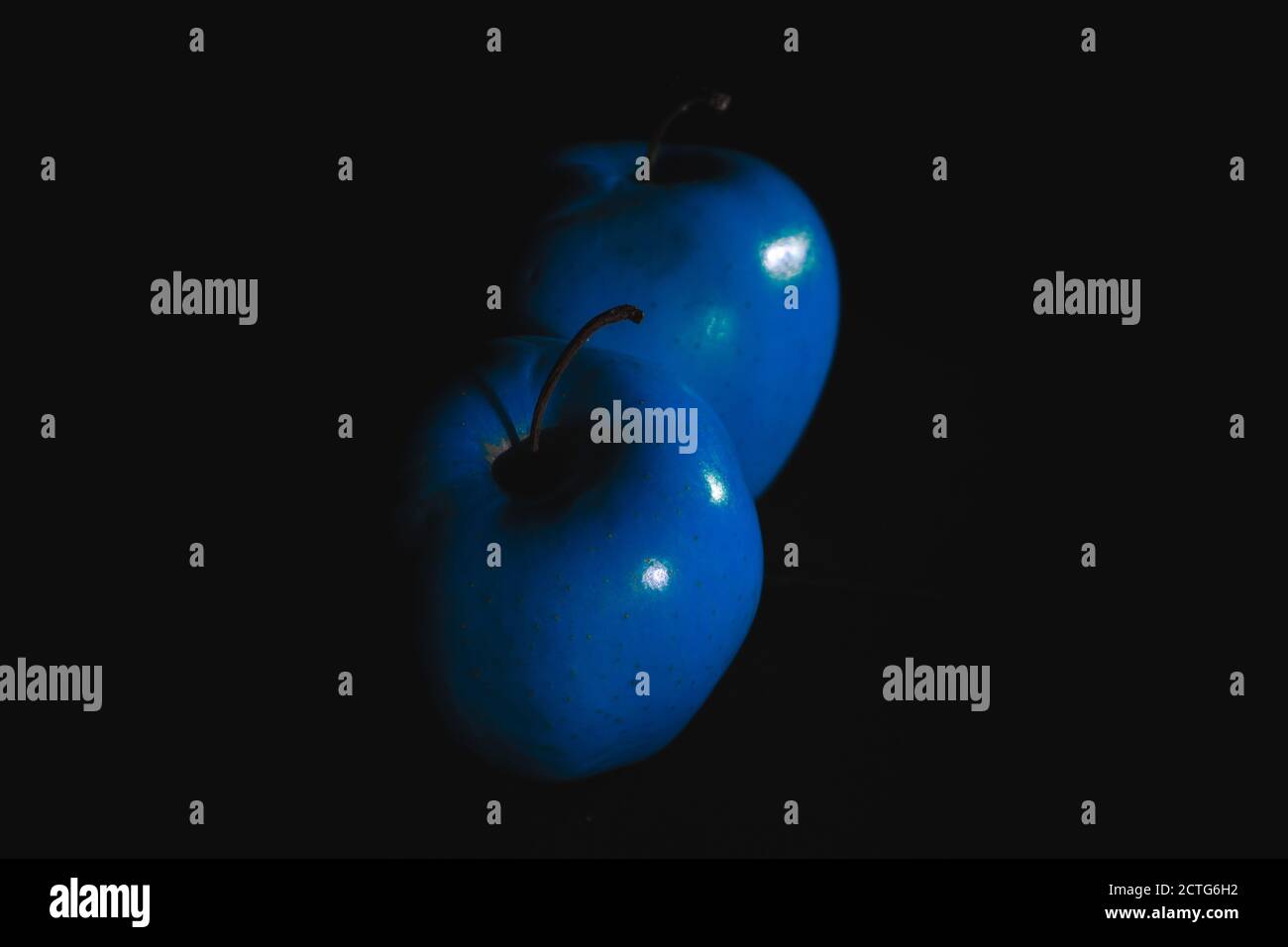 Apple fruit, abstract shadow, black background, blue apple Stock Photo ...