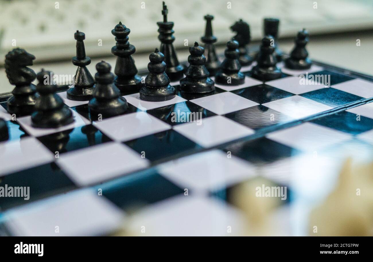 A hard shadow from the chess pieces placed on the Board Stock Photo - Alamy