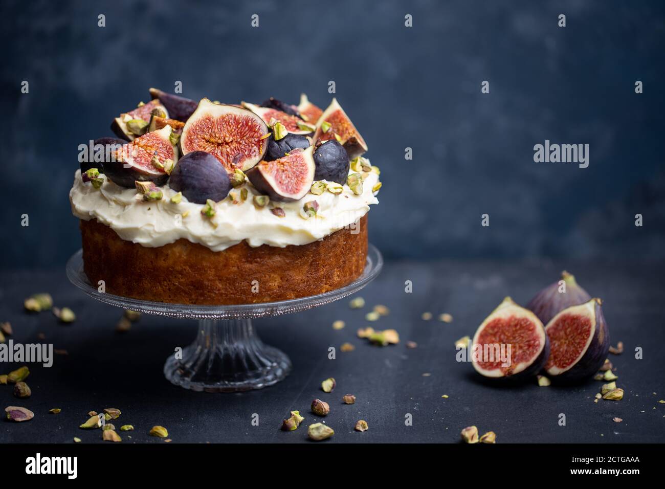 Persian fig cake with fresh fruit, cream and pistachios Stock Photo - Alamy