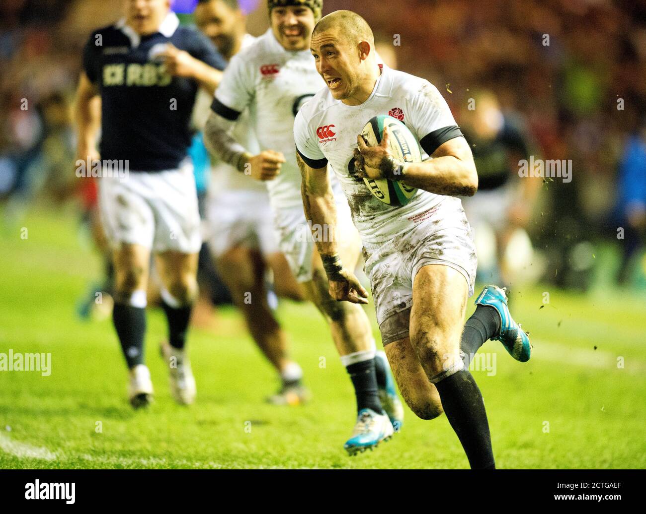 MIKE BROWN CHARGES THROUGH TO SCORE A TRY FOR ENGLAND. SCOTLAND v ...