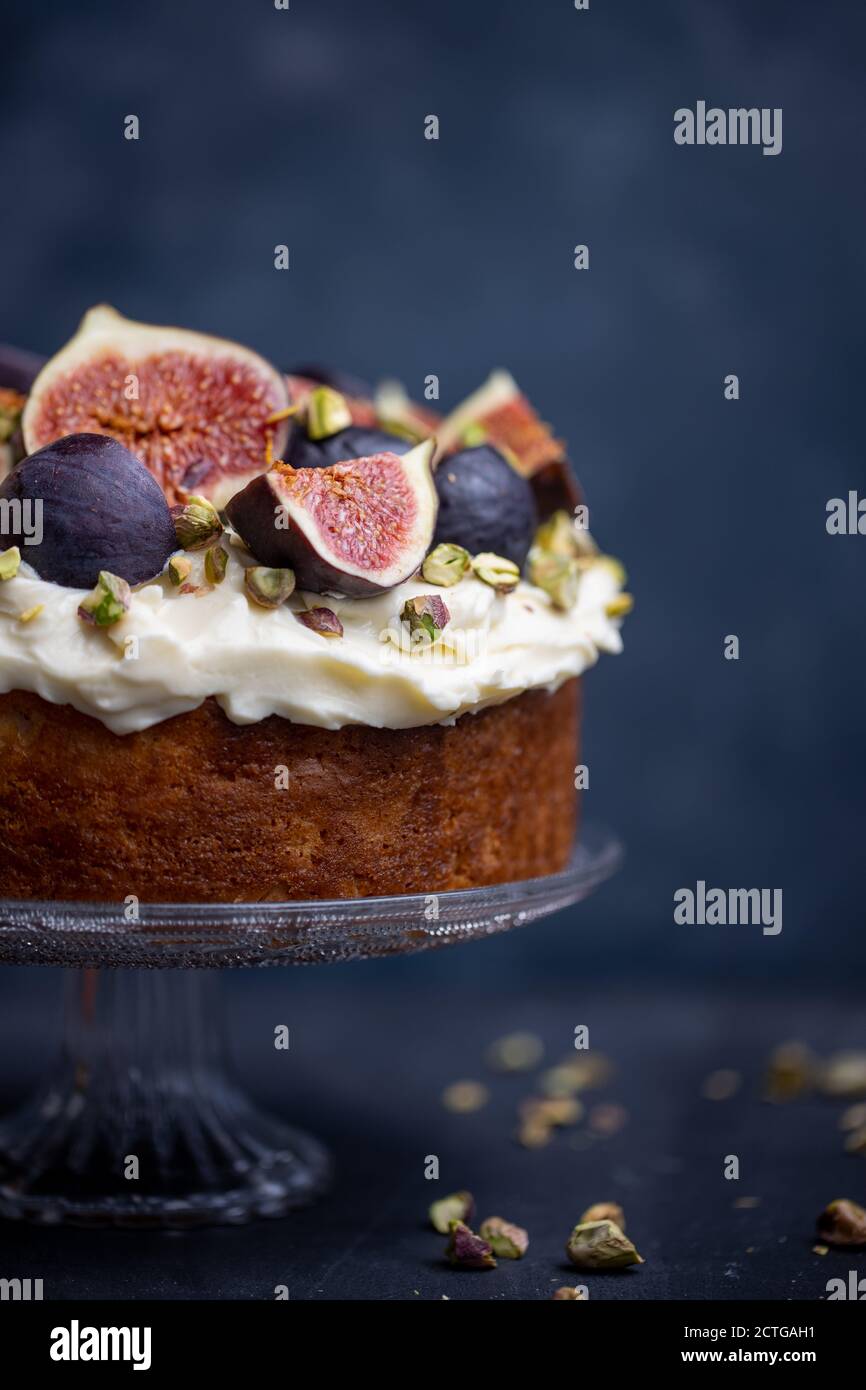 Persian fig cake with fresh fruit, cream and pistachios Stock Photo - Alamy