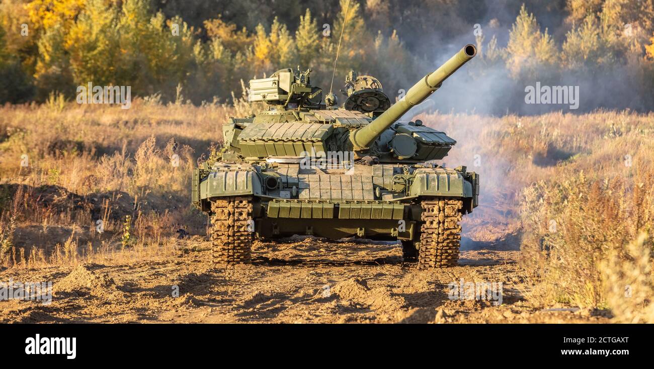 A front shot of russian tank T-64 moving in the field Stock Photo - Alamy