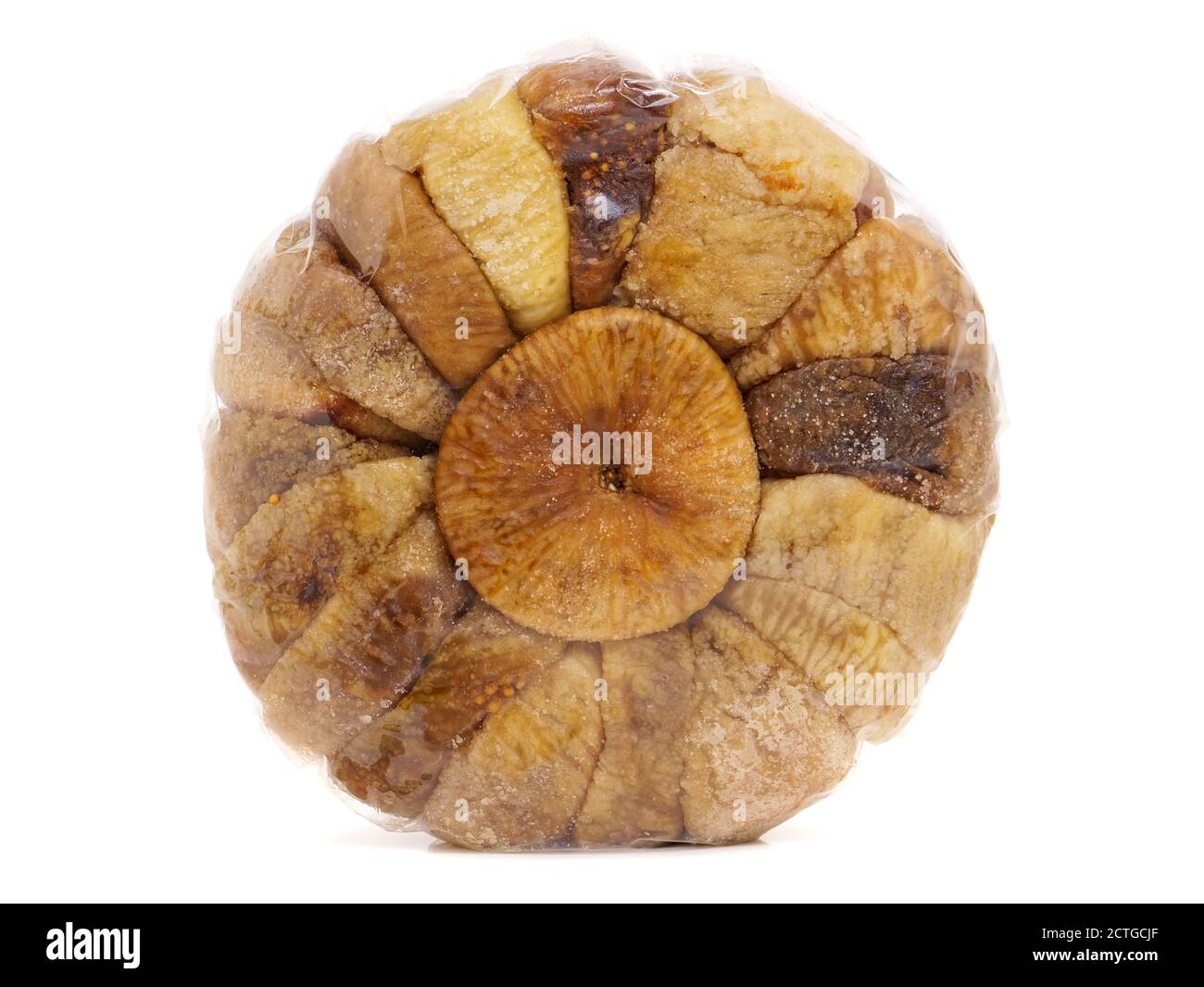Round package of dried figs isolated on white Stock Photo - Alamy