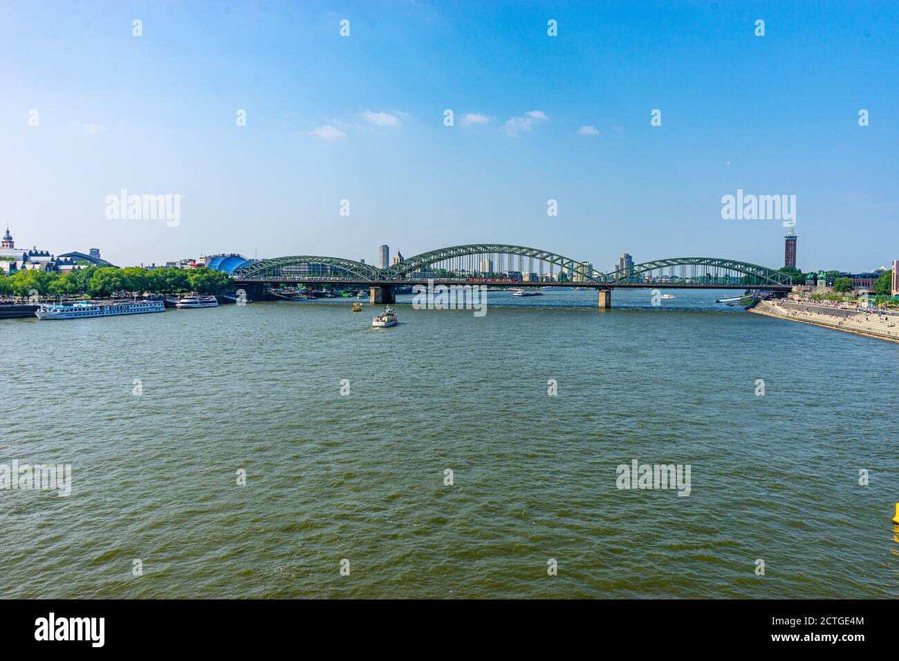 Cologne city skyline along the Rhine river with Hohenzollern Bridge ...