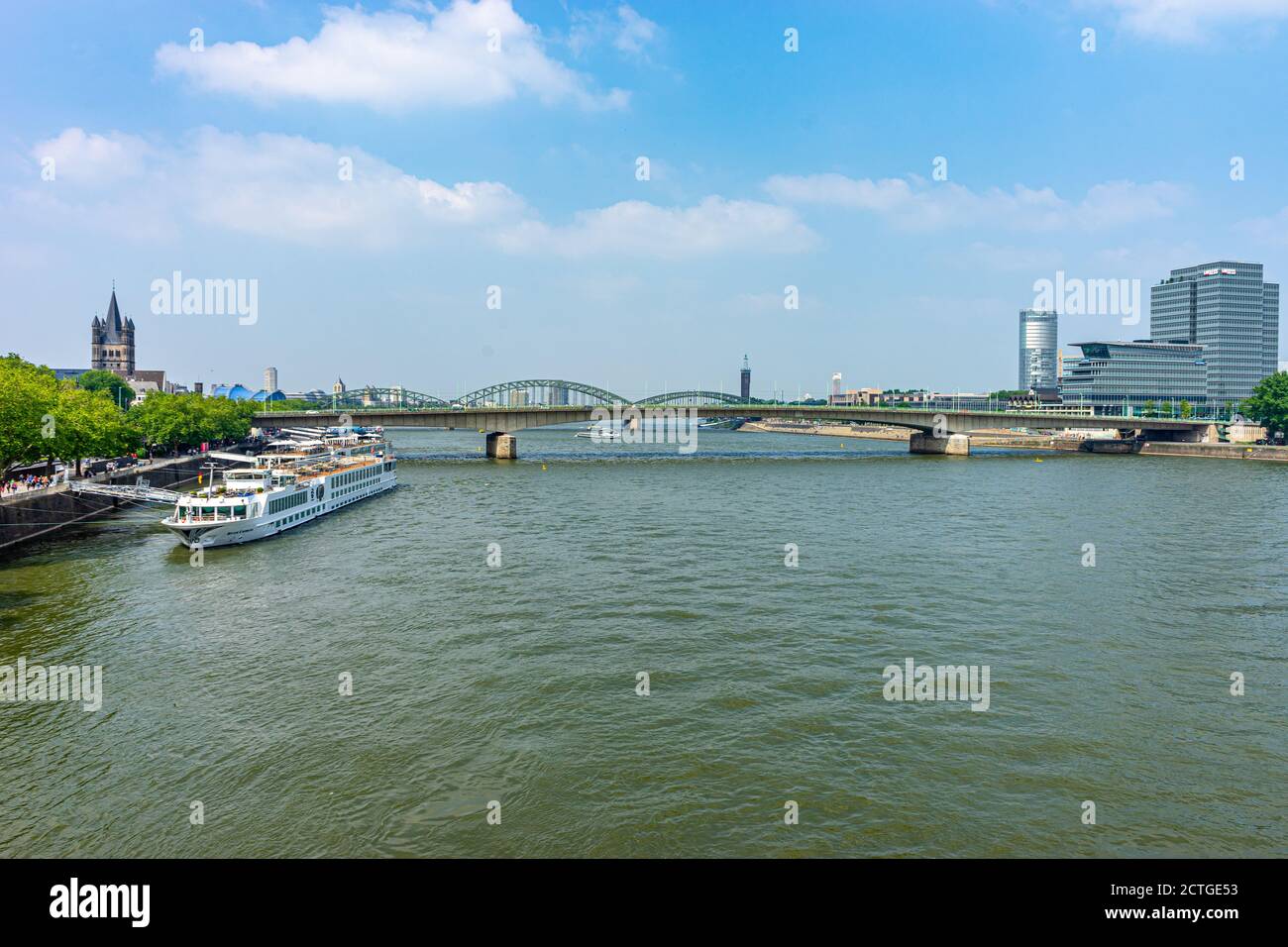 Cologne city skyline along the Rhine river with Hohenzollern Bridge ...