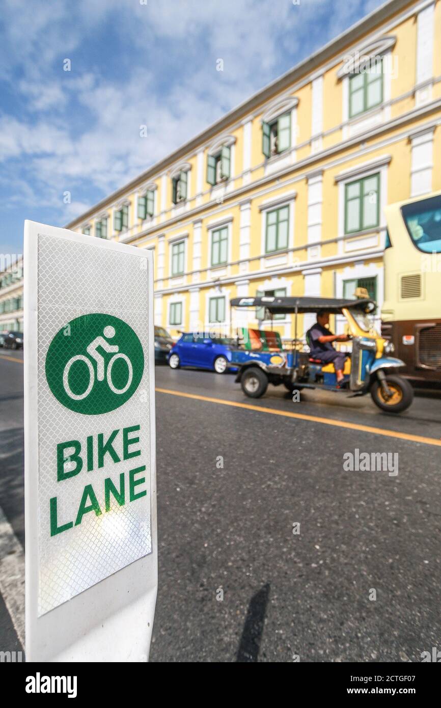 Bicycle lens Tuk tuk in the city blue sky background Stock Photo - Alamy