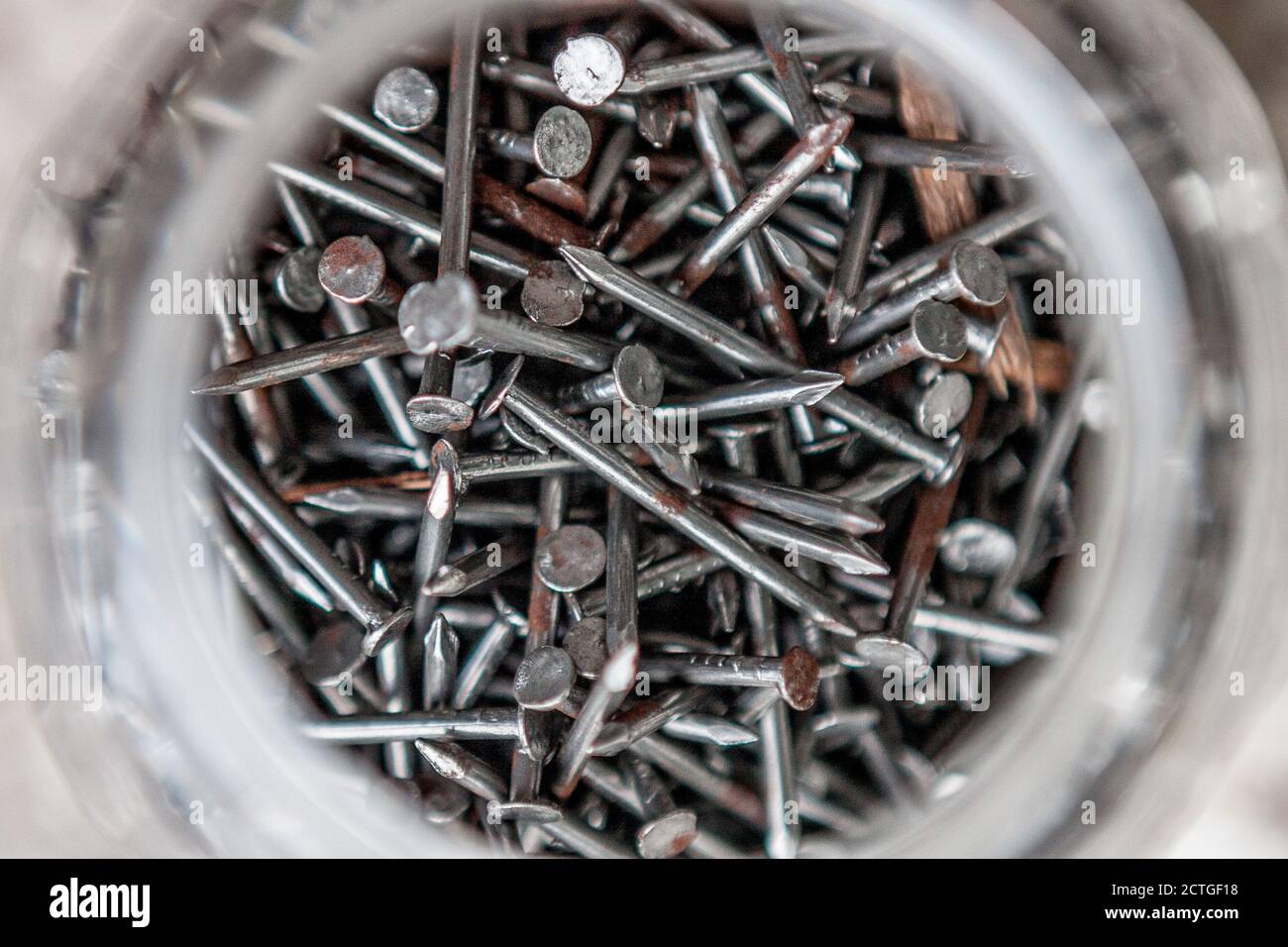 Many nails in jar texture background Stock Photo - Alamy
