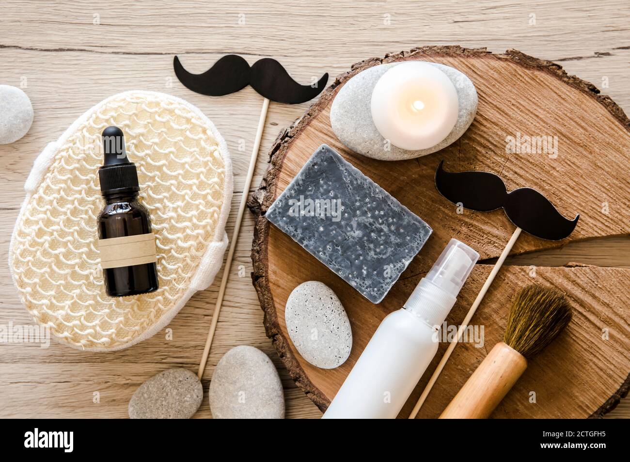 Above view set of various man spa products things. Natural wood disc ...