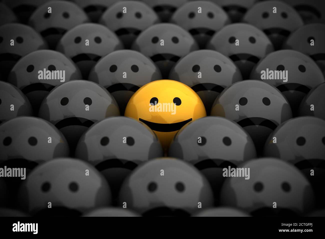 smiley face in the middle of grey crowd Stock Photo - Alamy