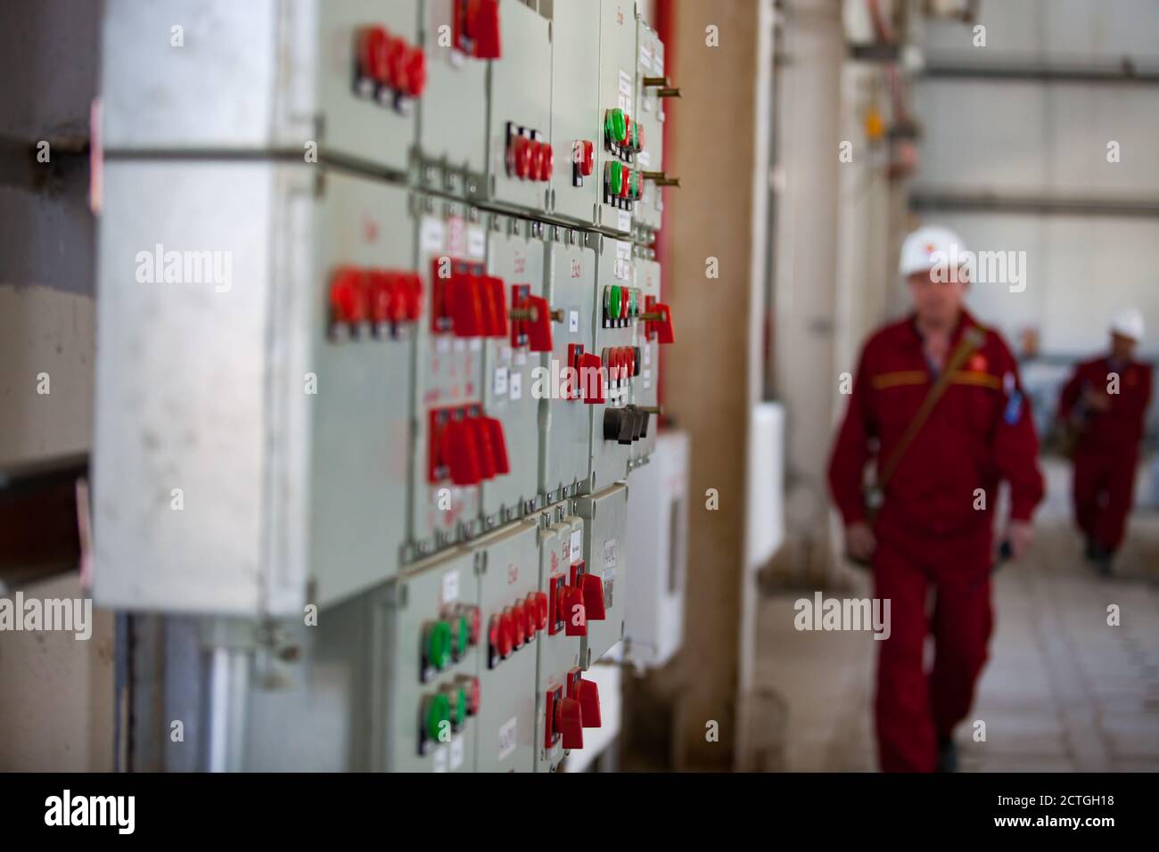 Electric equipment panel and remote control (console). Refinery workers ...