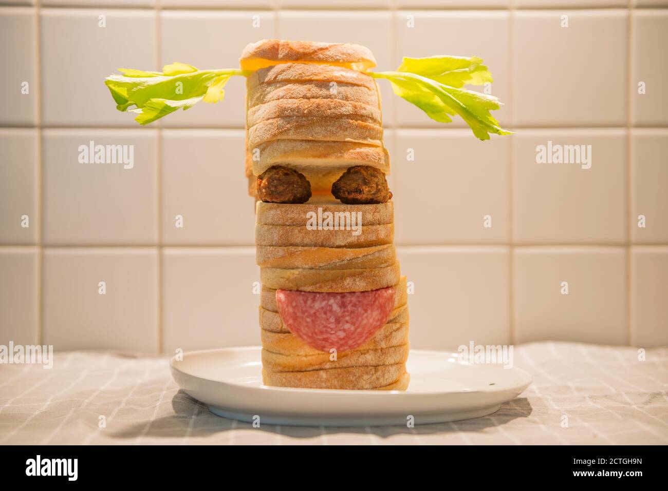 Tall Sandwich with Human Face Stock Photo - Alamy