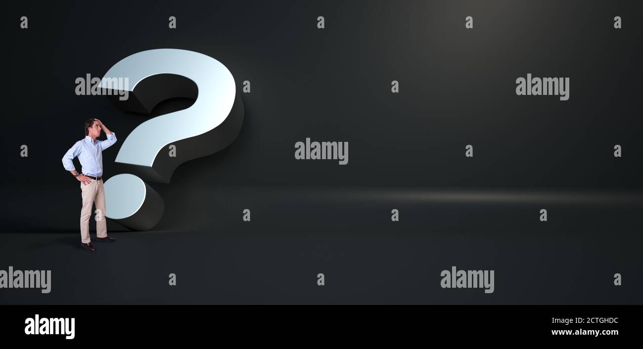 A man with a gesture of forgeting and a big question mark Stock Photo ...