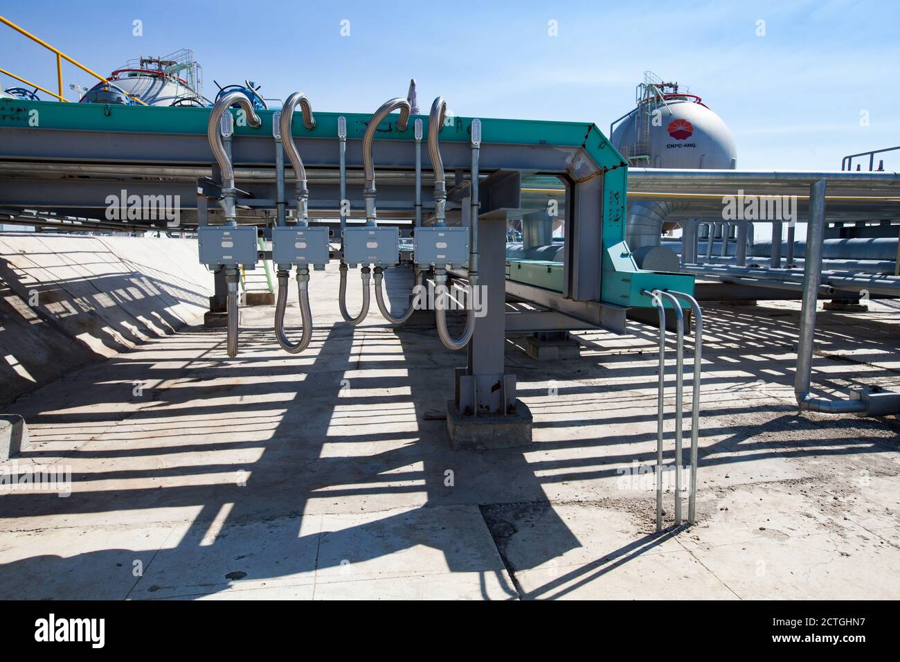 Aktobe region,Kazakhstan:Pipes and equipment.Sphere gas storage tanks ...