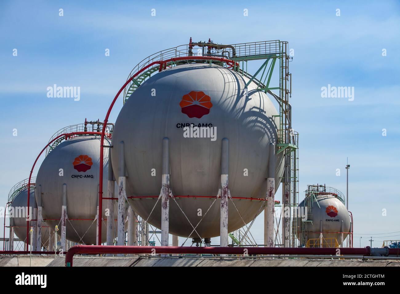 Aktobe region, Kazakhstan: Oil refinery plant in desert. Sphere gas ...