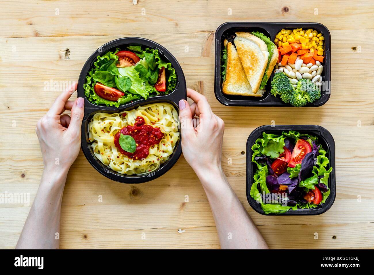 Food delivery background. Take away meal in boxes. Top view Stock Photo ...
