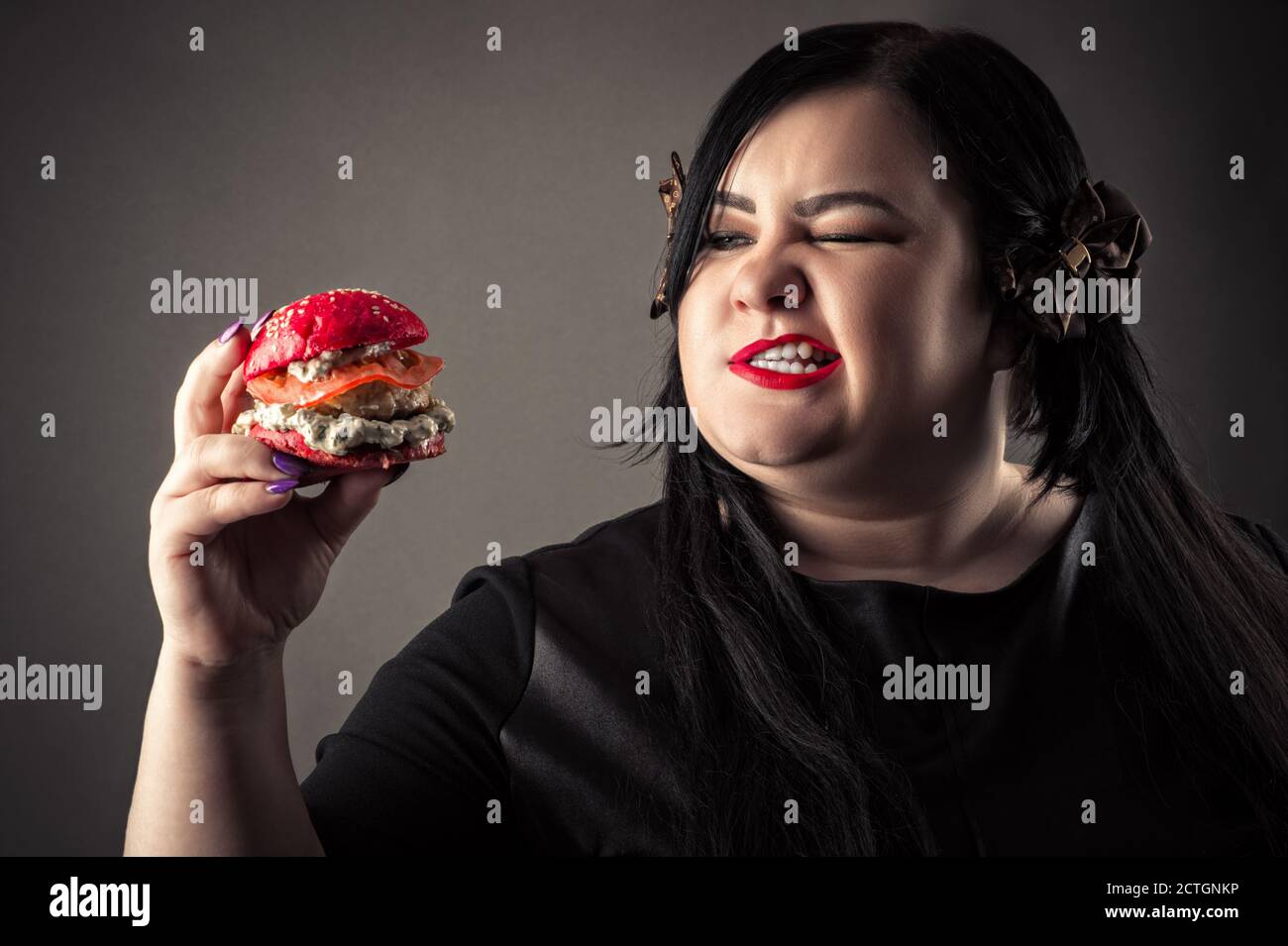Gluttony fat woman eat food hi-res stock photography and images - Alamy