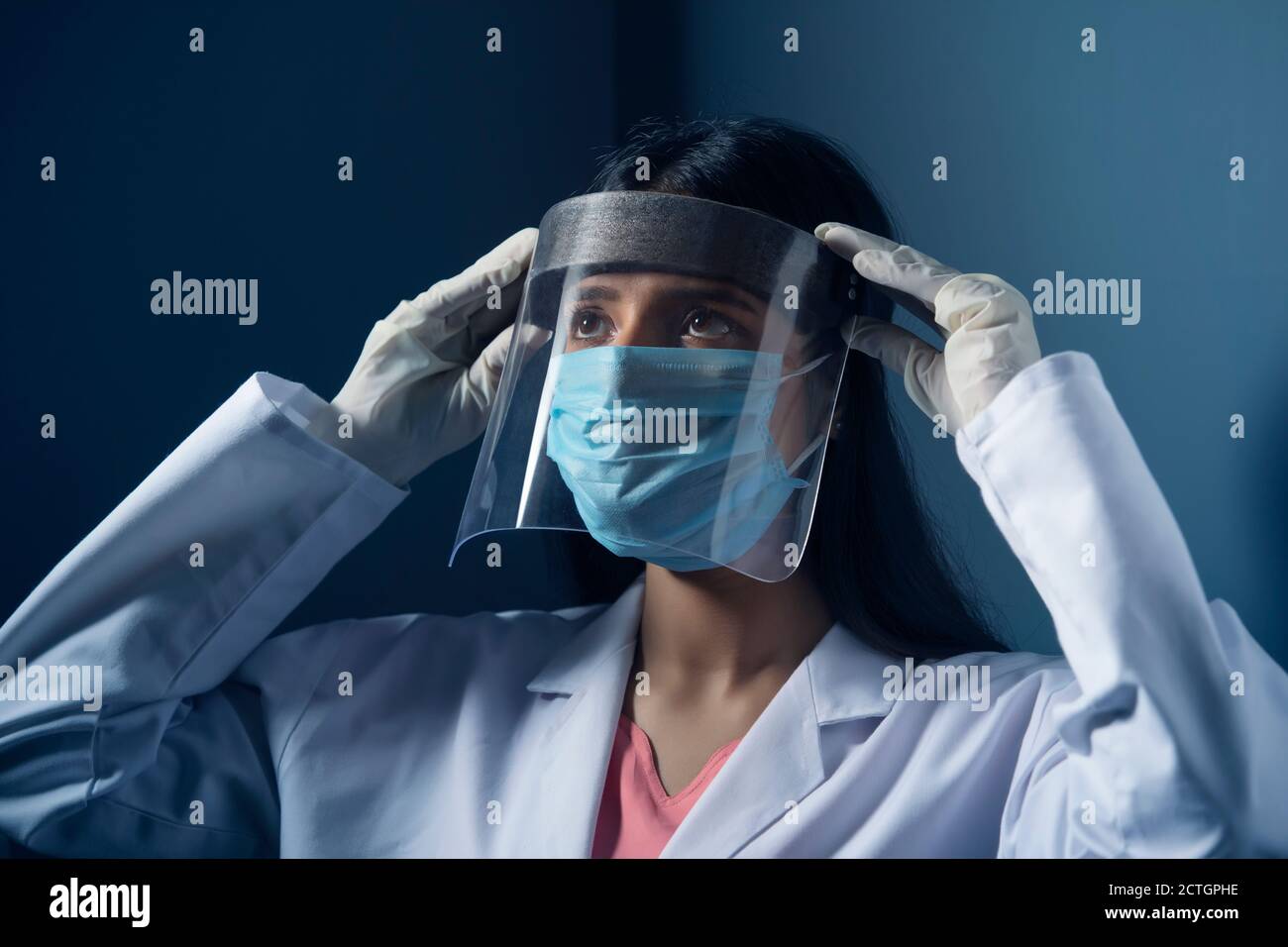 Wearing a face shield hi-res stock photography and images - Alamy