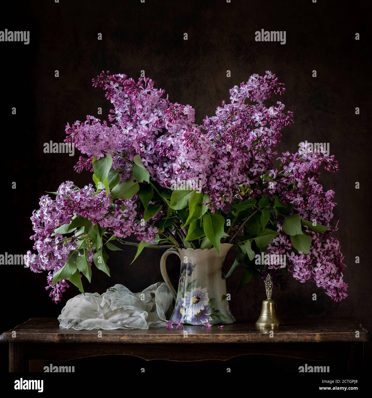 Spring still life study with lilac Stock Photo - Alamy