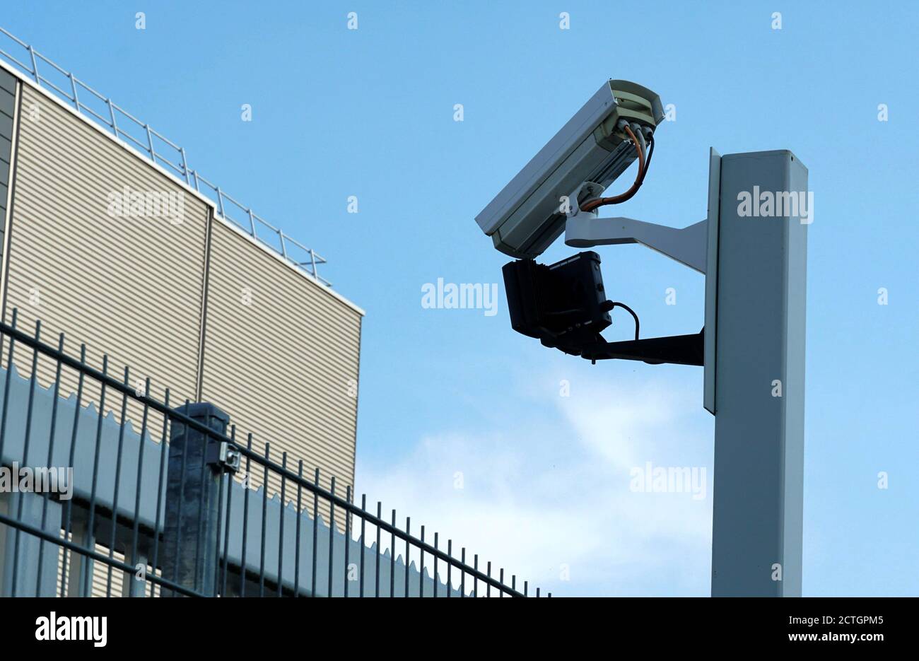 CCTV security camera on a post to watch factory yard of private company ...