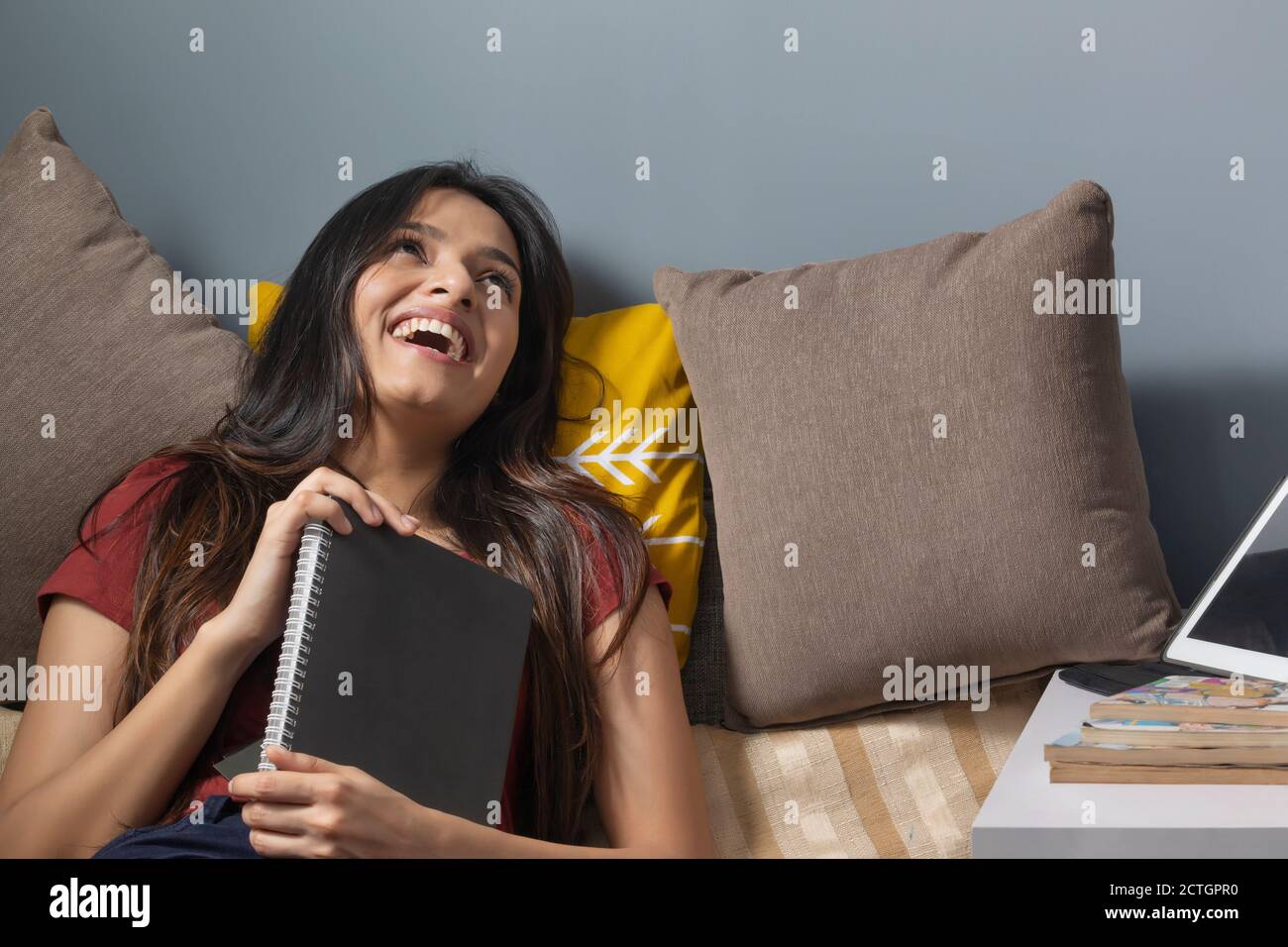 Woman laughing after reading hi-res stock photography and images - Alamy