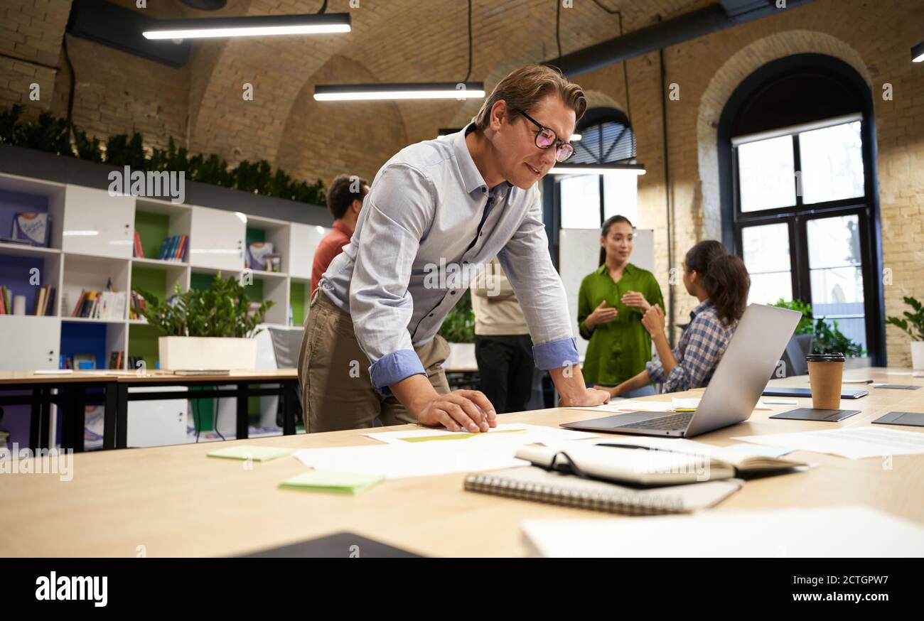 Young people looking something on hi-res stock photography and images ...