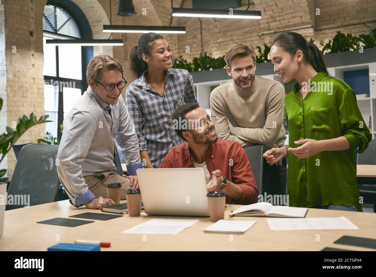 Successful project team. Group of young happy multicultural business ...