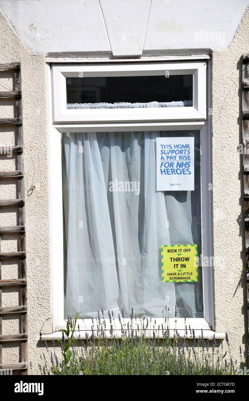 Nhs poster window pay hi-res stock photography and images - Alamy