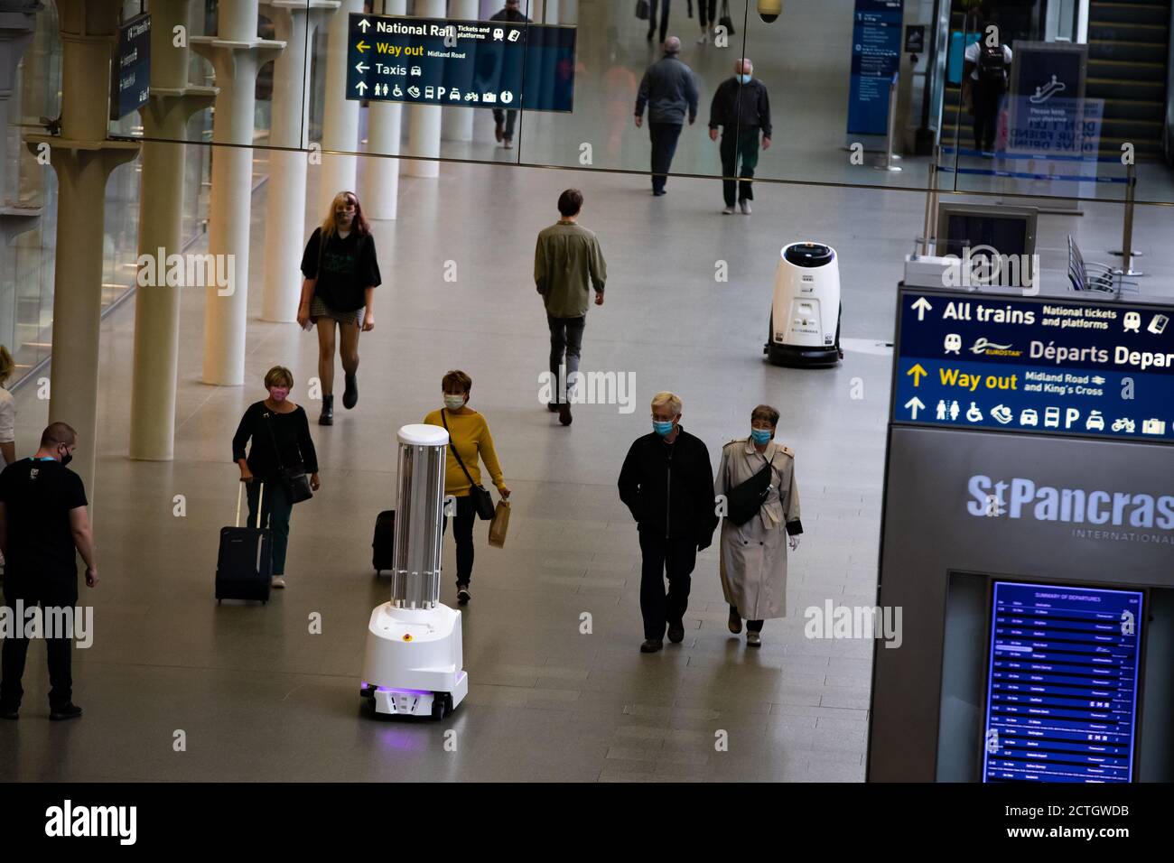 An Eco Bot 50 cleans and disinfects surfaces simultaneously with an ...