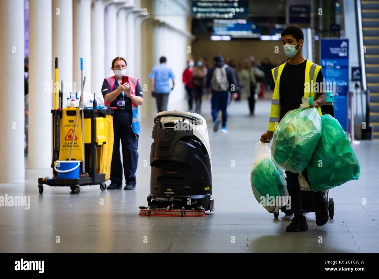 An Eco Bot 50 robot cleans and disinfects surfaces simultaneously with ...
