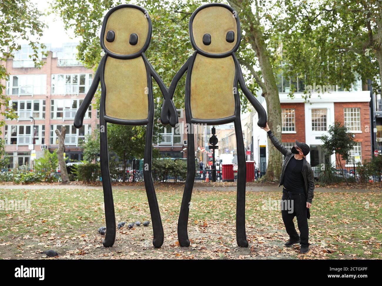 Artist and Hackney resident STIK at the launch of his 4-metre-high ...