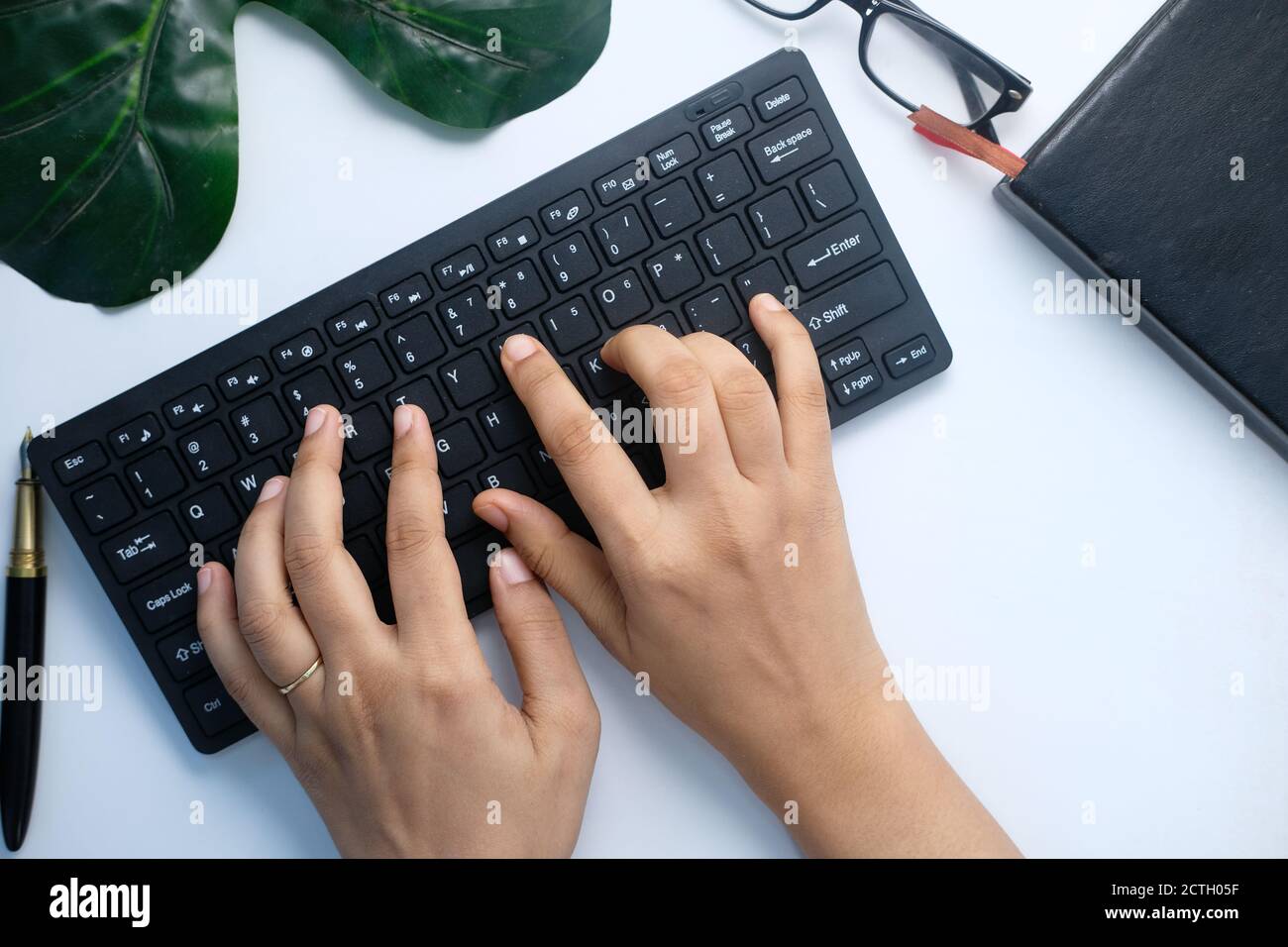 Women typing hi-res stock photography and images - Alamy