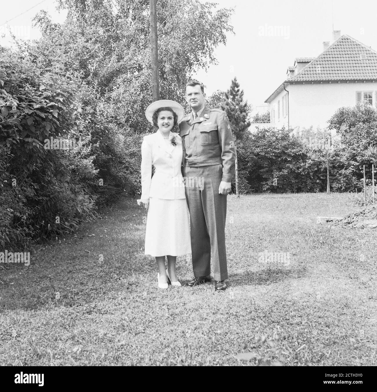 1940s newly wed U.S. military couple pose for picture post World War ...