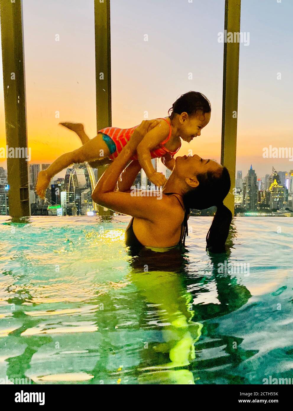 Baby in swimming pool hi-res stock photography and images - Alamy