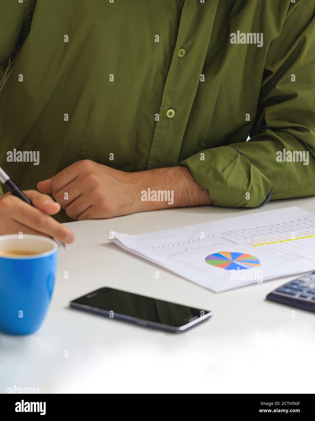 Man preparing a business report, office desk background, closeup view ...