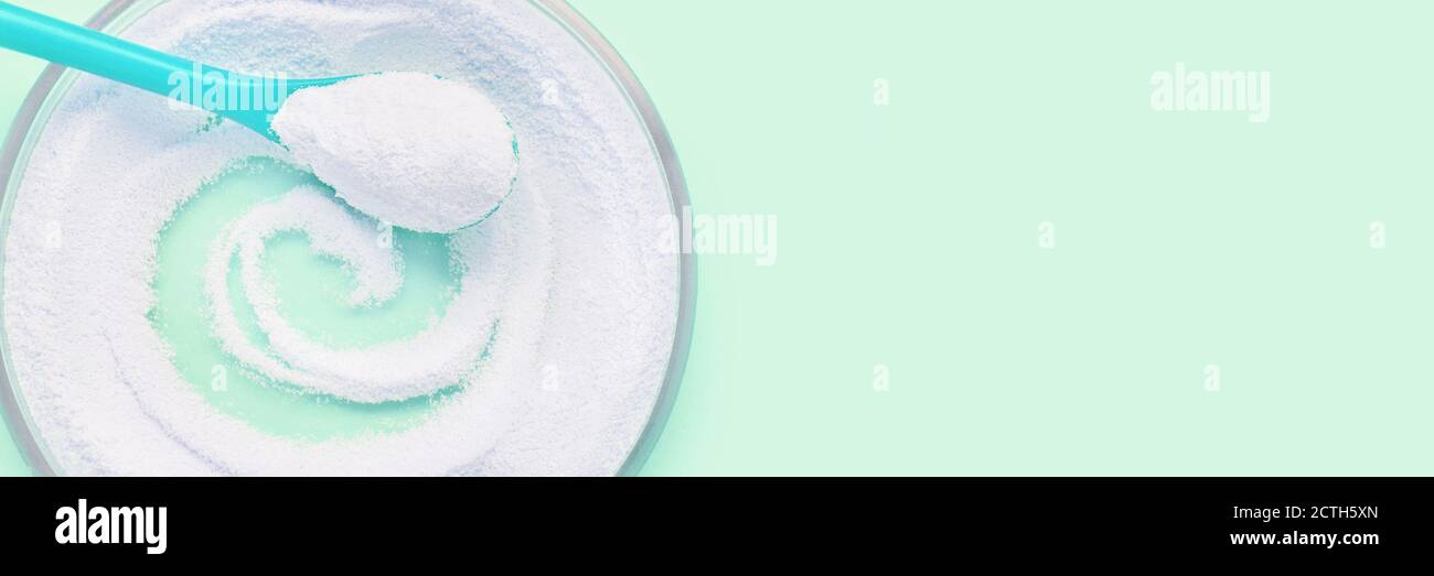 Collagen white powder. Pastel color background. Health product Stock ...