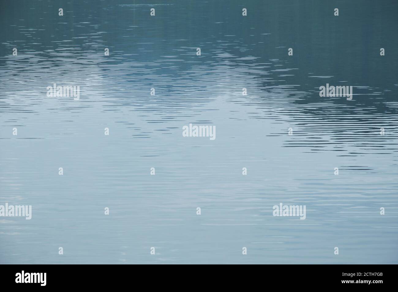 water rippled and spreading on lake background and texture Stock Photo ...
