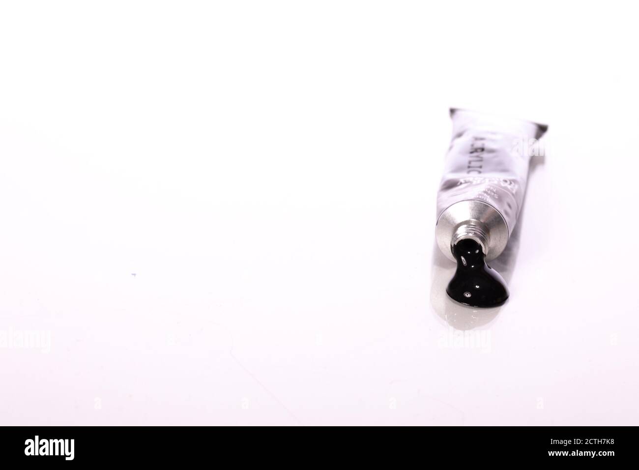 Squeezed black tube of acrylic paint isolated on white background Stock ...
