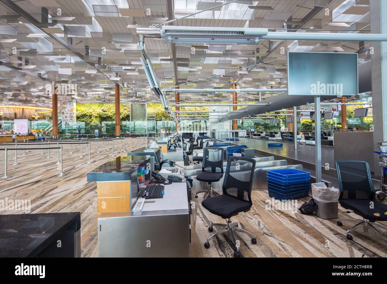 Manual check-in counters at Changi Airport Terminal 3 is deserted, is a ...