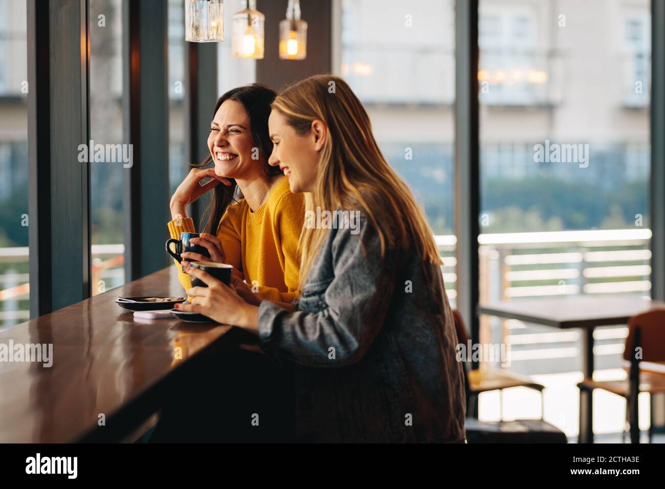 Two women in cafe having a drink hi-res stock photography and images ...