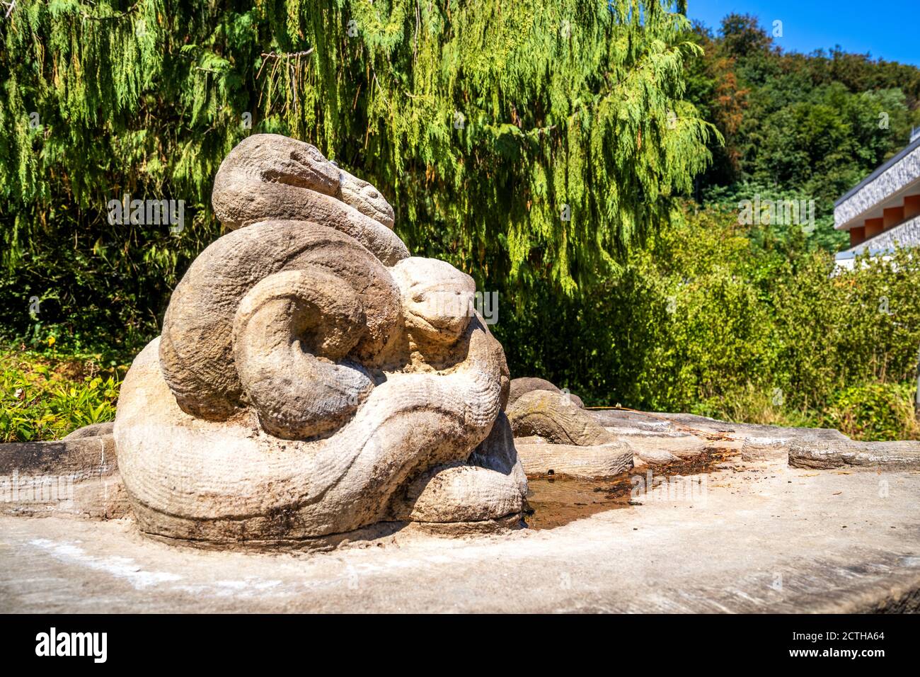 snake fountain, Schlangenbad, Taunus, Germany Stock Photo - Alamy