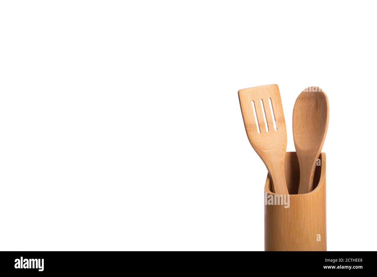 kitchen spoon and spatula in stand isolated on white background copy ...