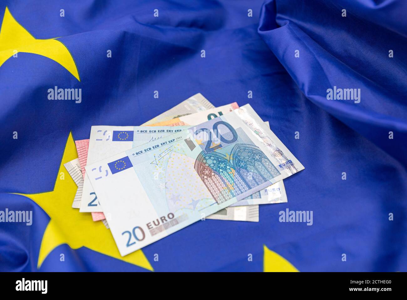 Flag of European Union EU and some money Euros on the top, concept ...