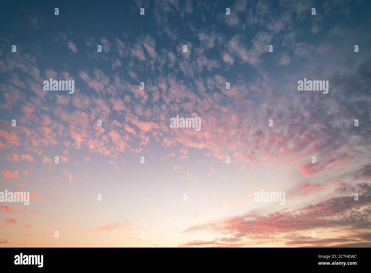 Cirrocumulus clouds sunset sky landscape at dusk Stock Photo - Alamy