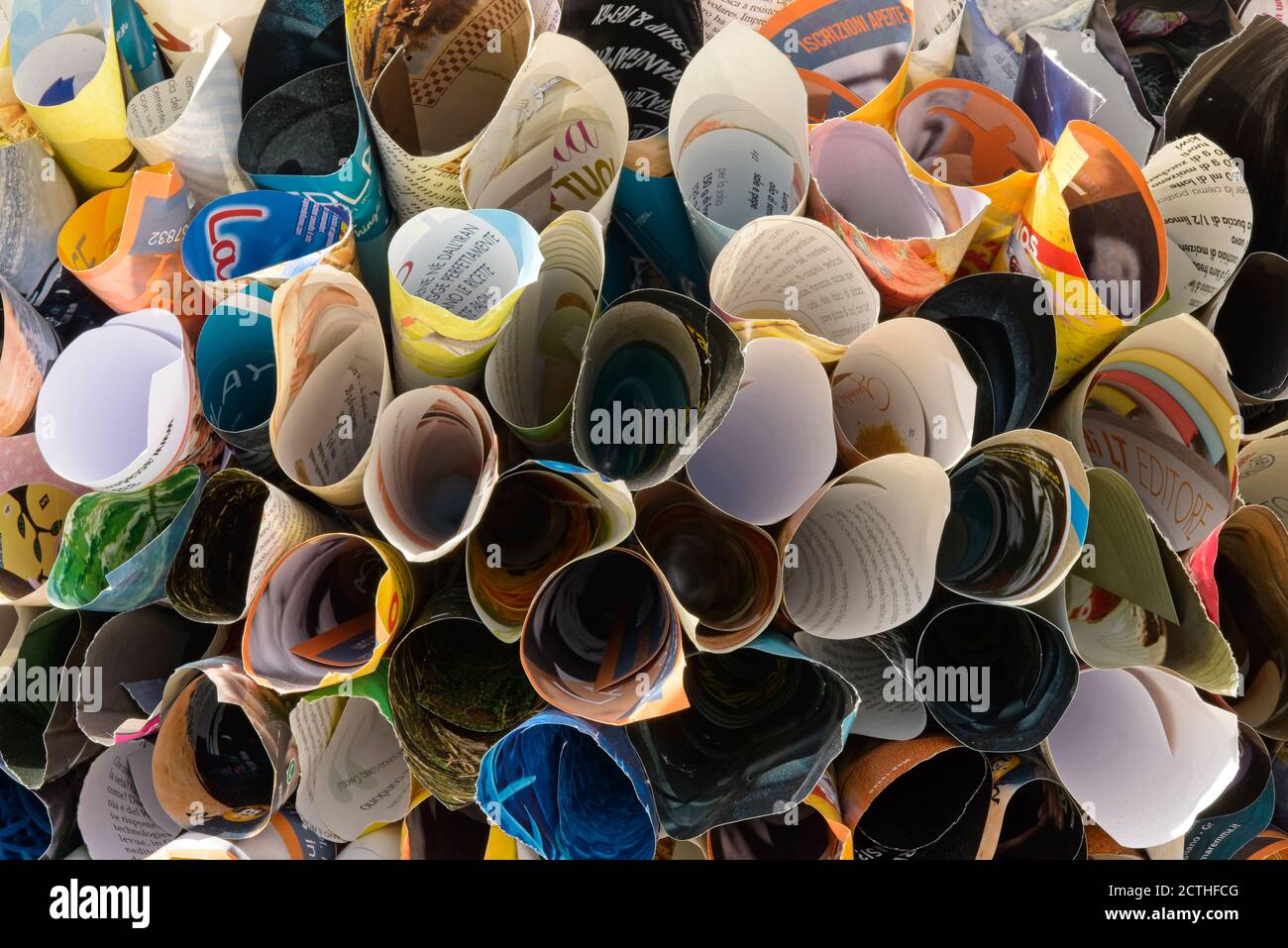 Recycled Ornamental object made of rolls of magazine paper pages Stock ...