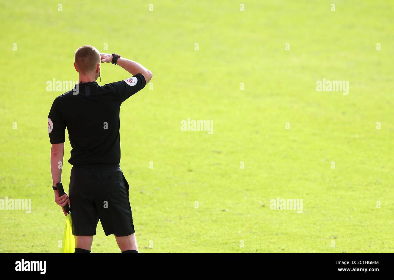 An assistant referee keeps an eye on the action Stock Photo - Alamy