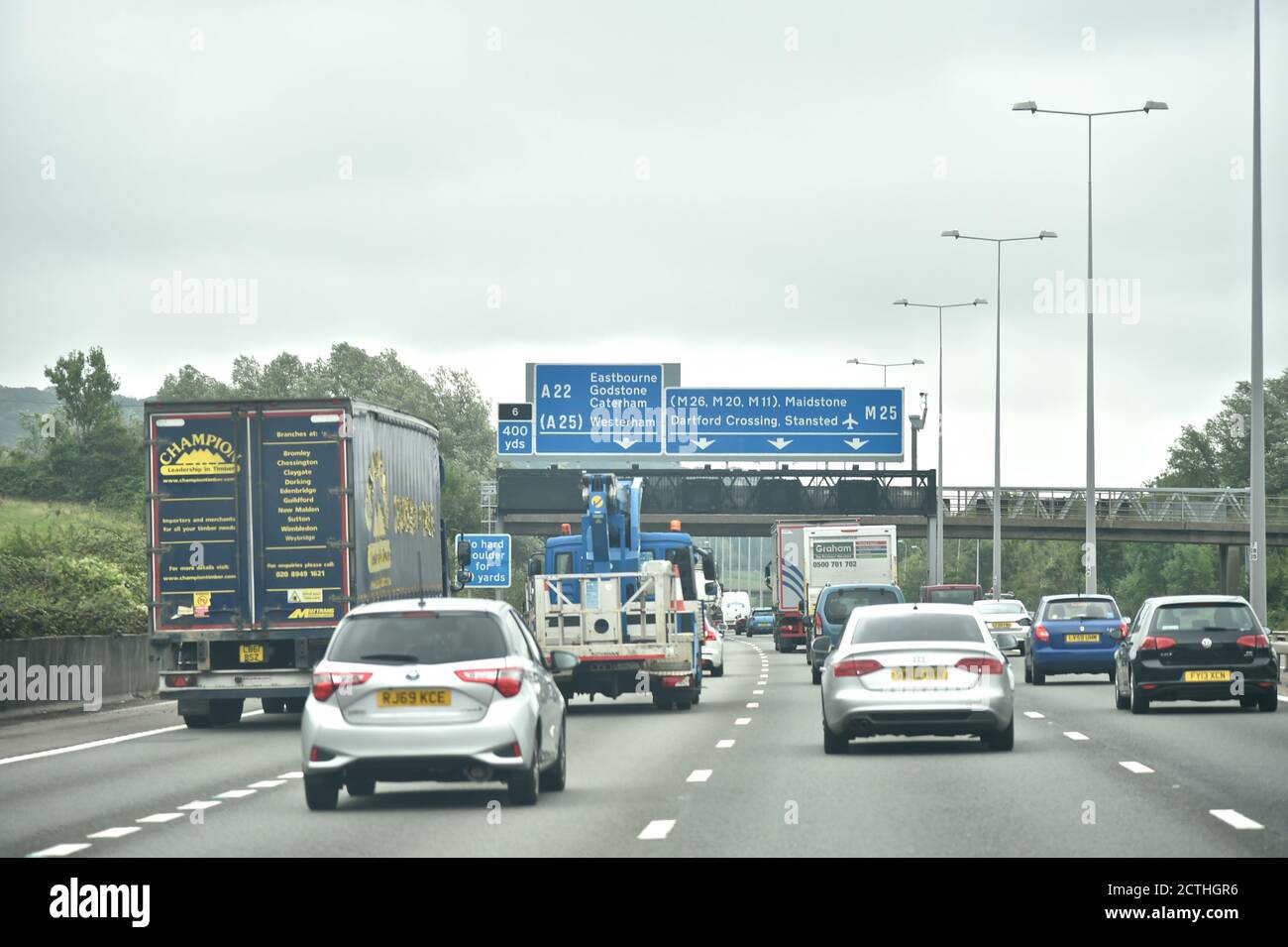 Motorway traffic and signage gantry Stock Photo - Alamy